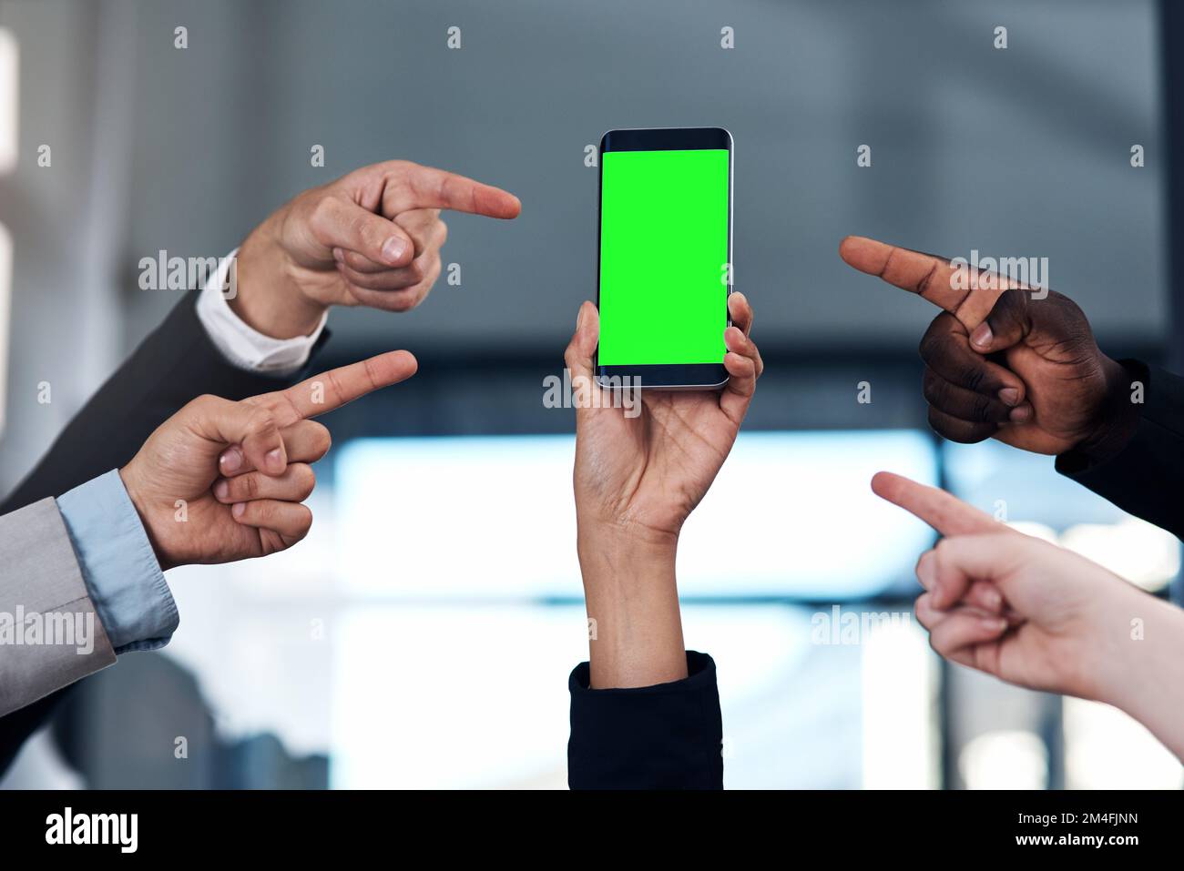 Man pointing smartphone green screen hi-res stock photography and ...