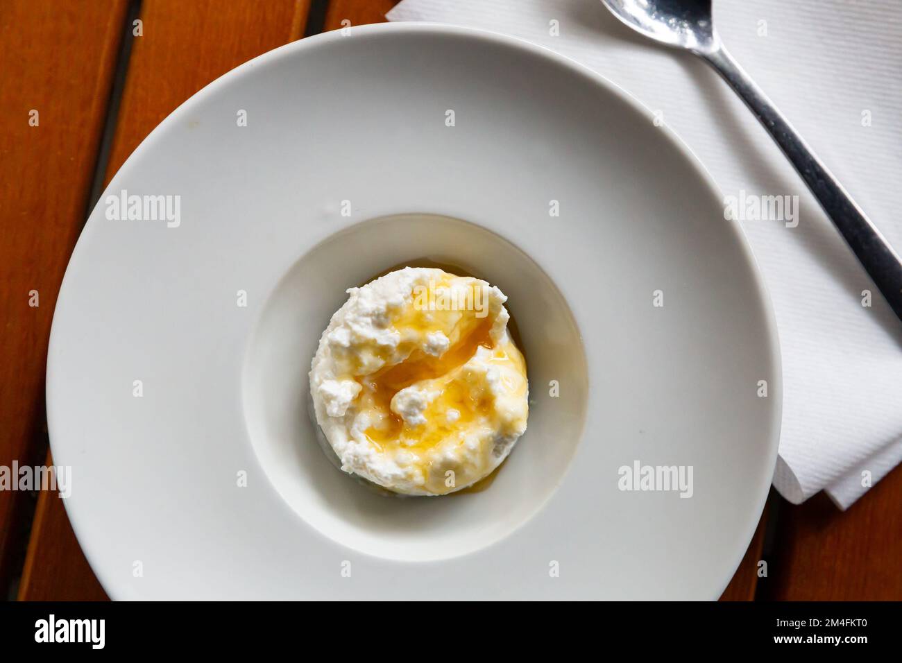 Cheese with honey - traditional Catalan dessert Stock Photo - Alamy