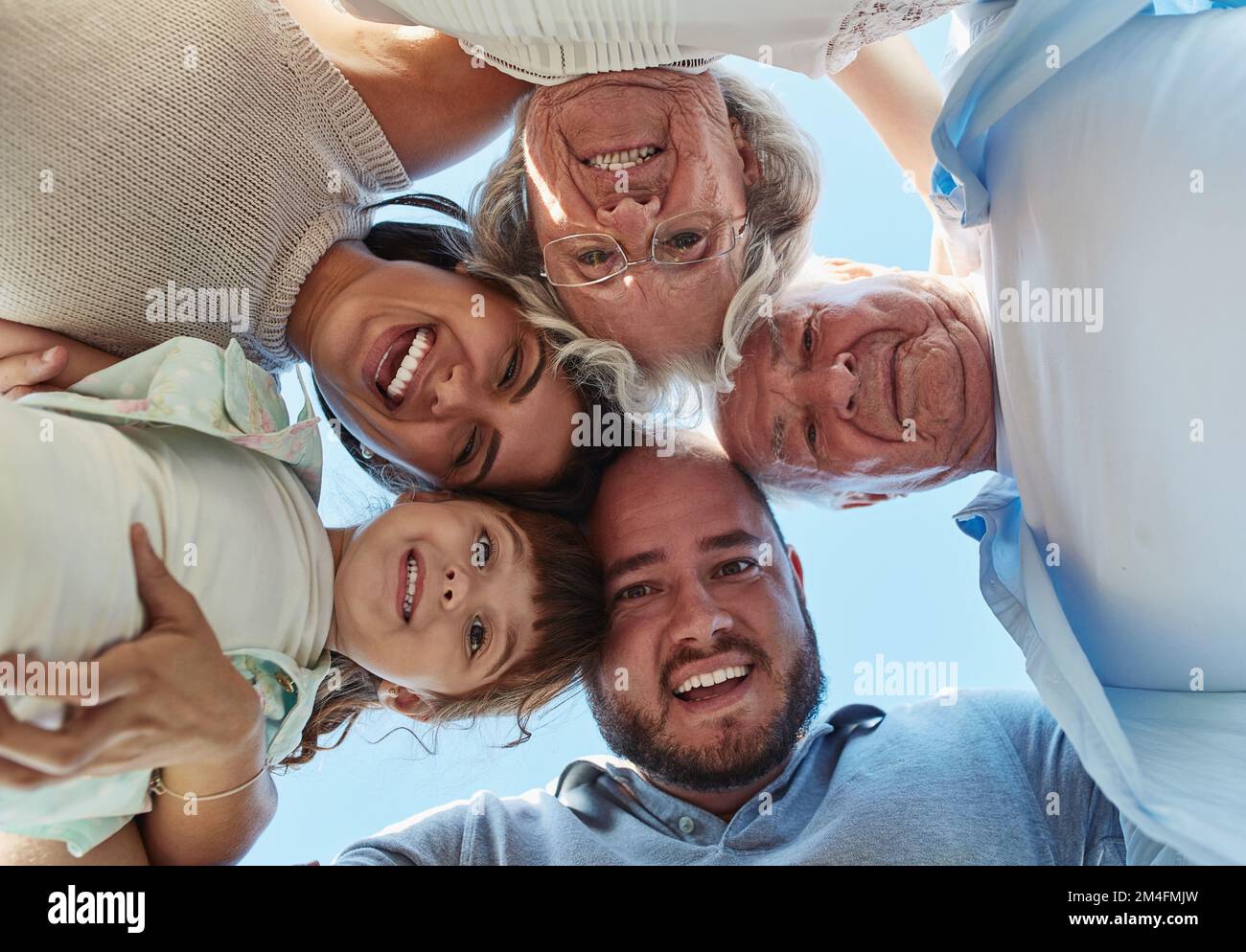 Our own little world created by love. Low angle portrait of a happy ...