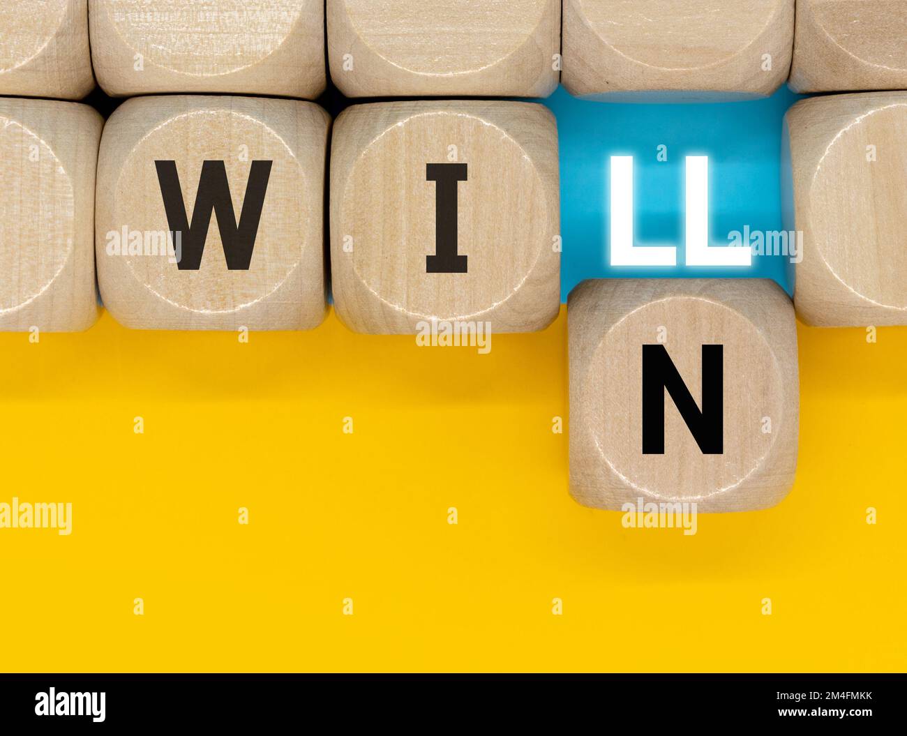 We will win symbol. Businessman turns cubes and changes the word will ...