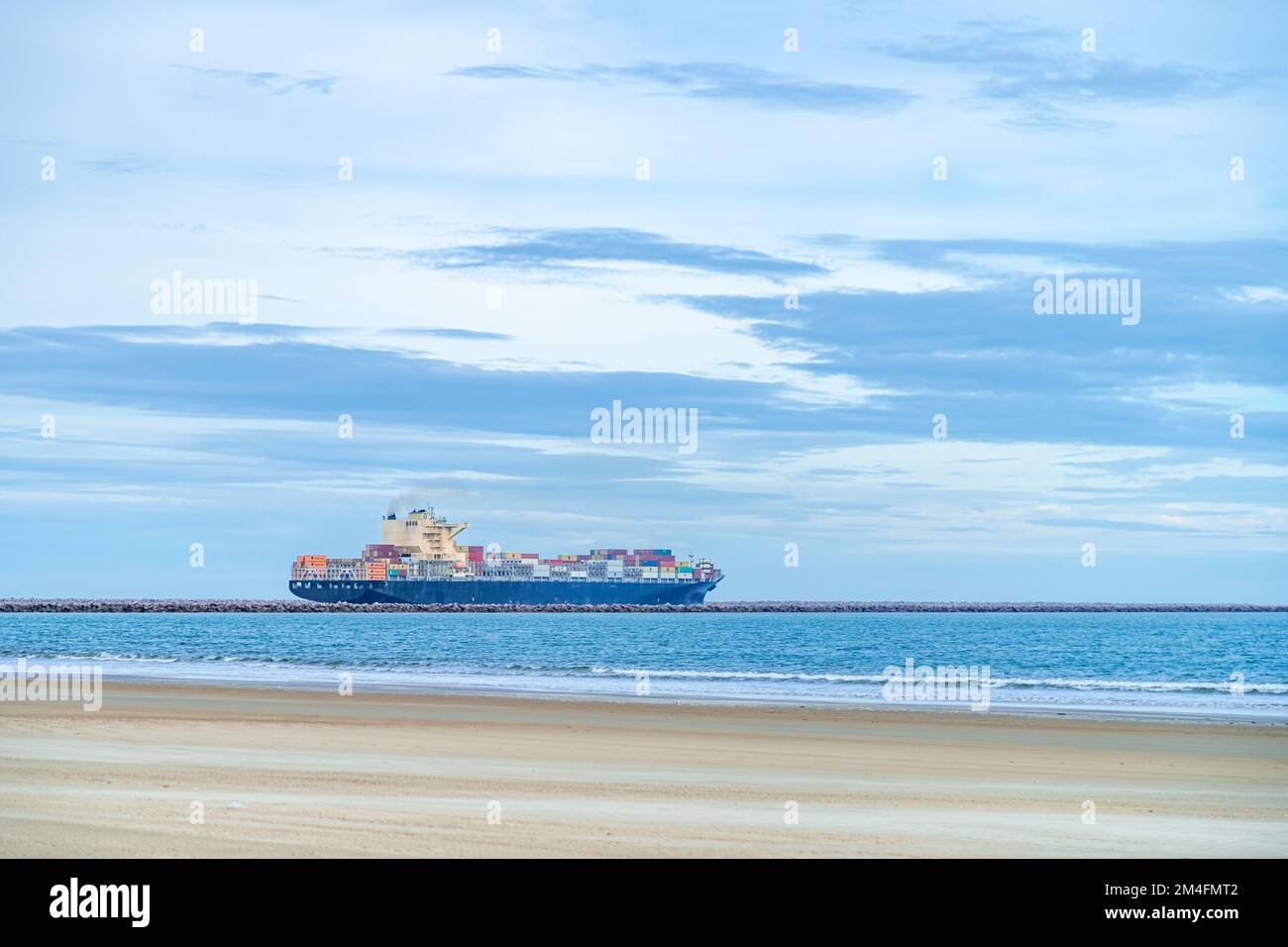 cargo ship at the sandy beach Stock Photo - Alamy