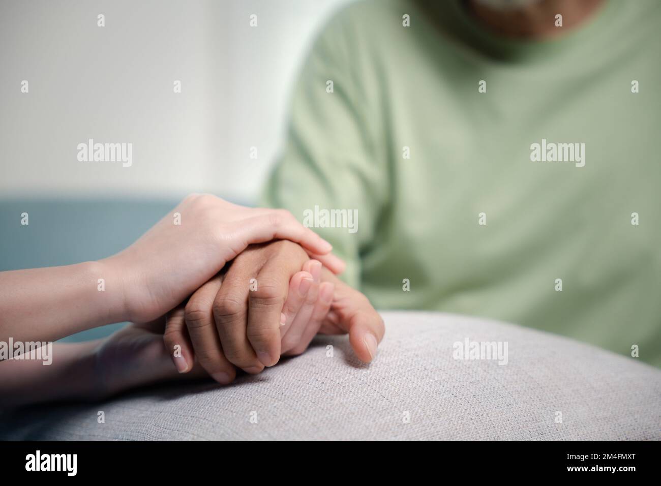 Caring nurse helping elderly old man care facility gets help Stock ...