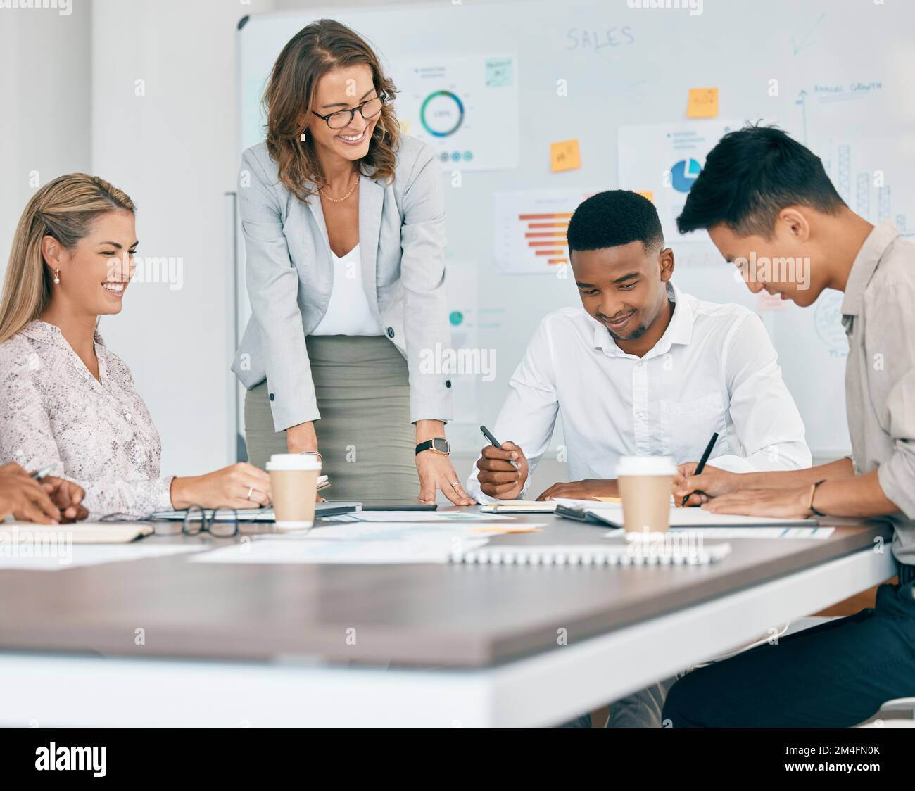 Coaching, presentation and review with business people in meeting for ...