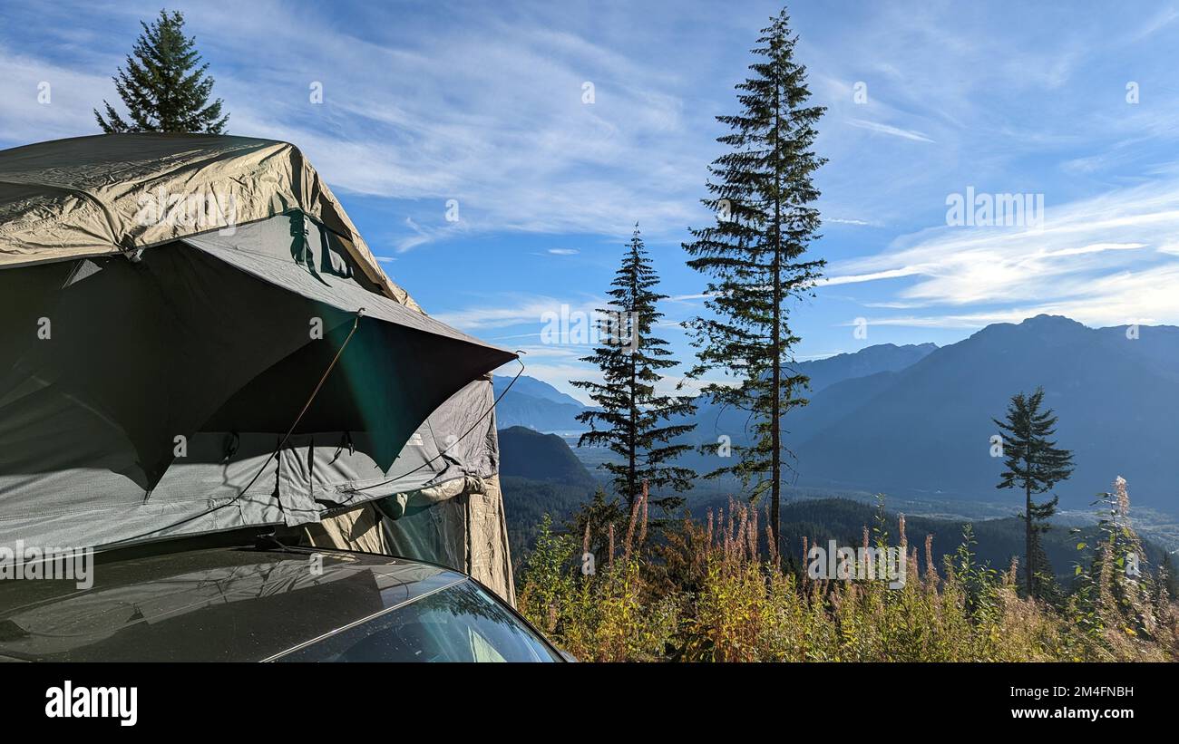 A close-up of a camping tent next to an off-road car in Squamish ...
