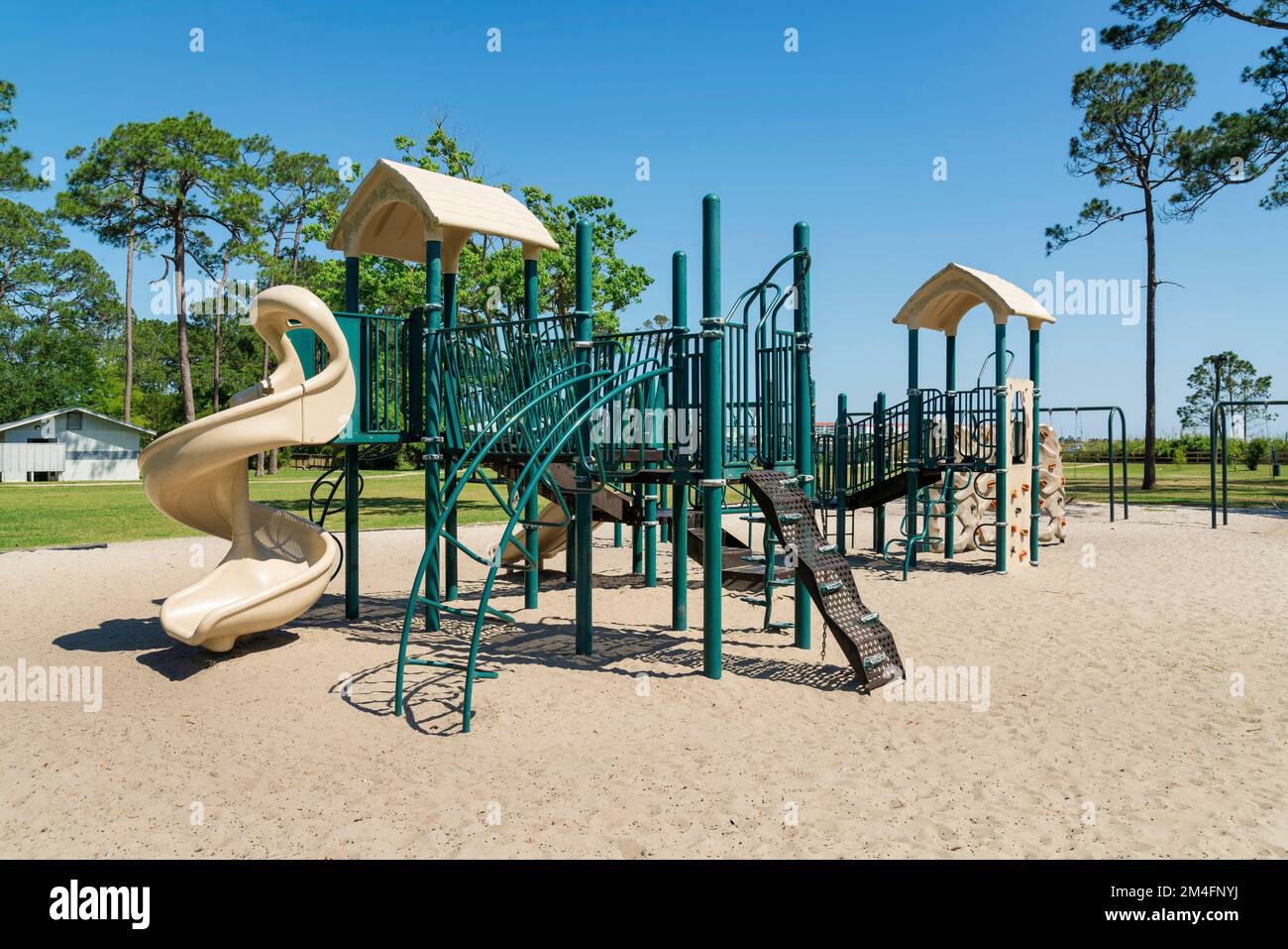 Destin, Florida- Playground with obstacles and slides against the view ...