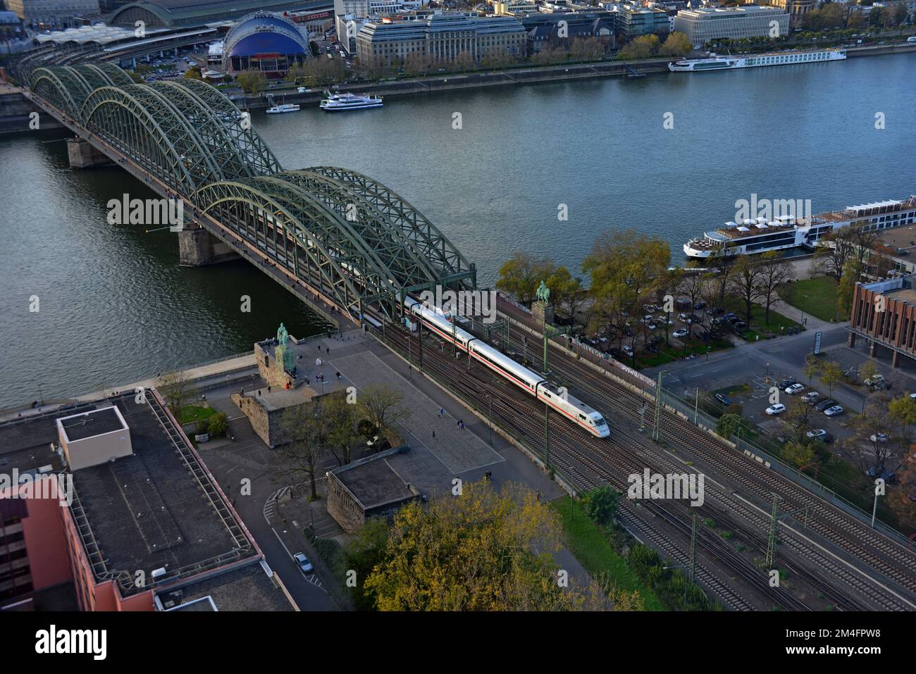 An aerial view of the Hohenzollern Bridge, River Rhine and a Deustche ...