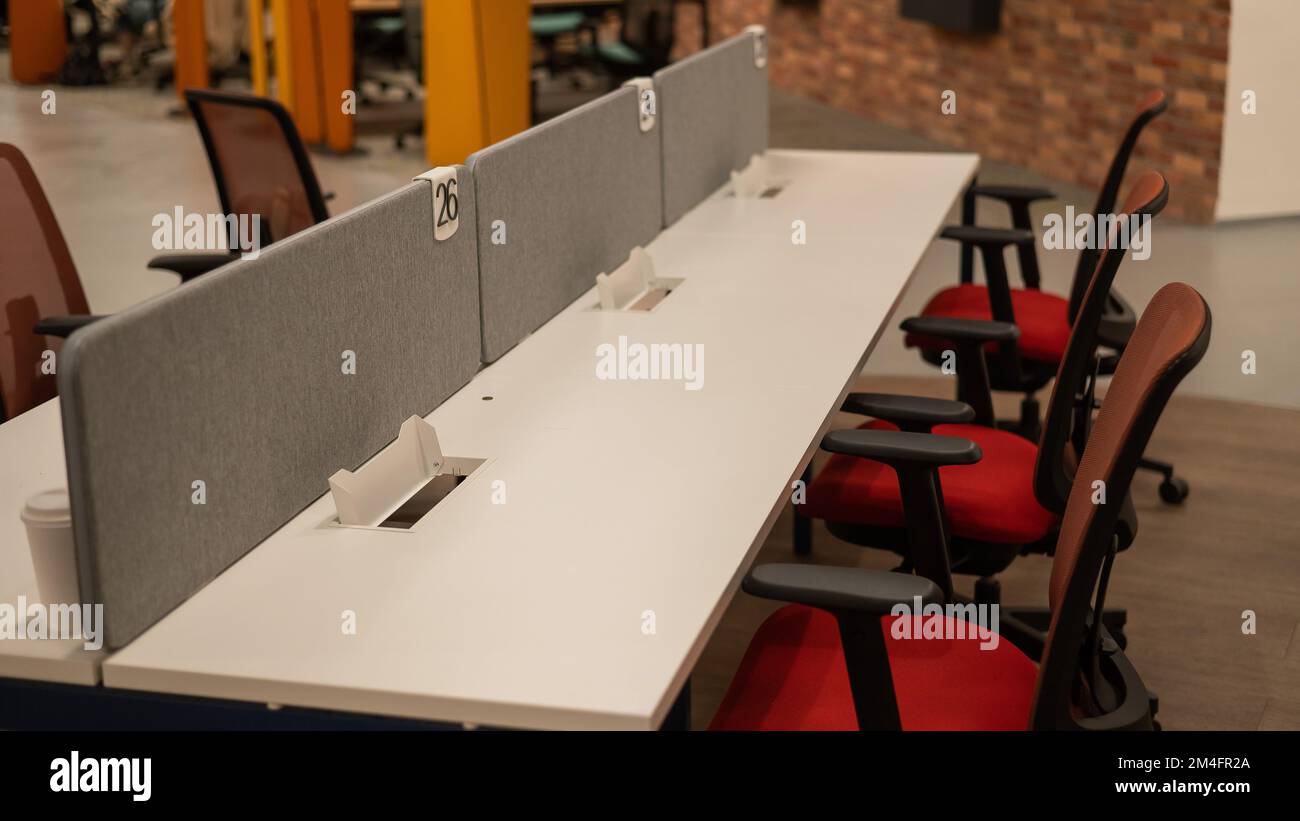 Empty office open space. Coworking space with white desks Stock Photo ...