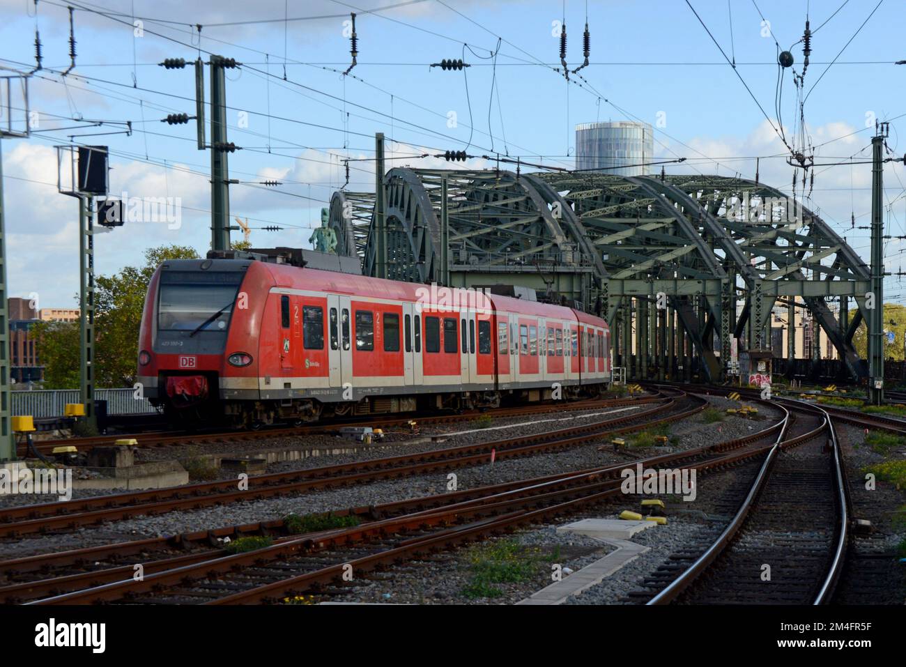 S Bahn suburban trains entering Cologne HBF Central Station by crossing ...