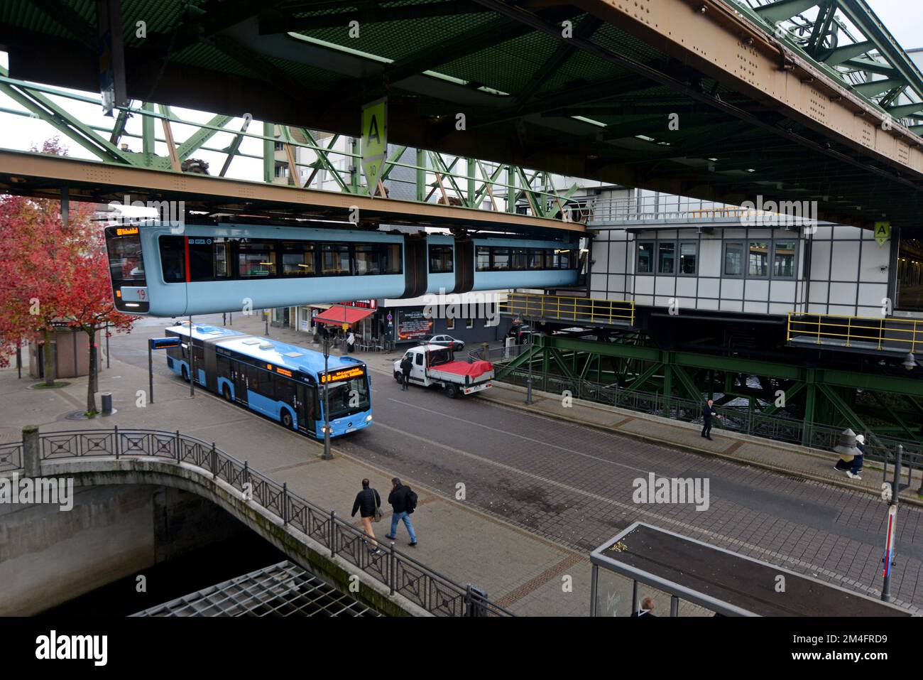 The unusual hanging monorail train knwn as the Schwebebahn, in ...