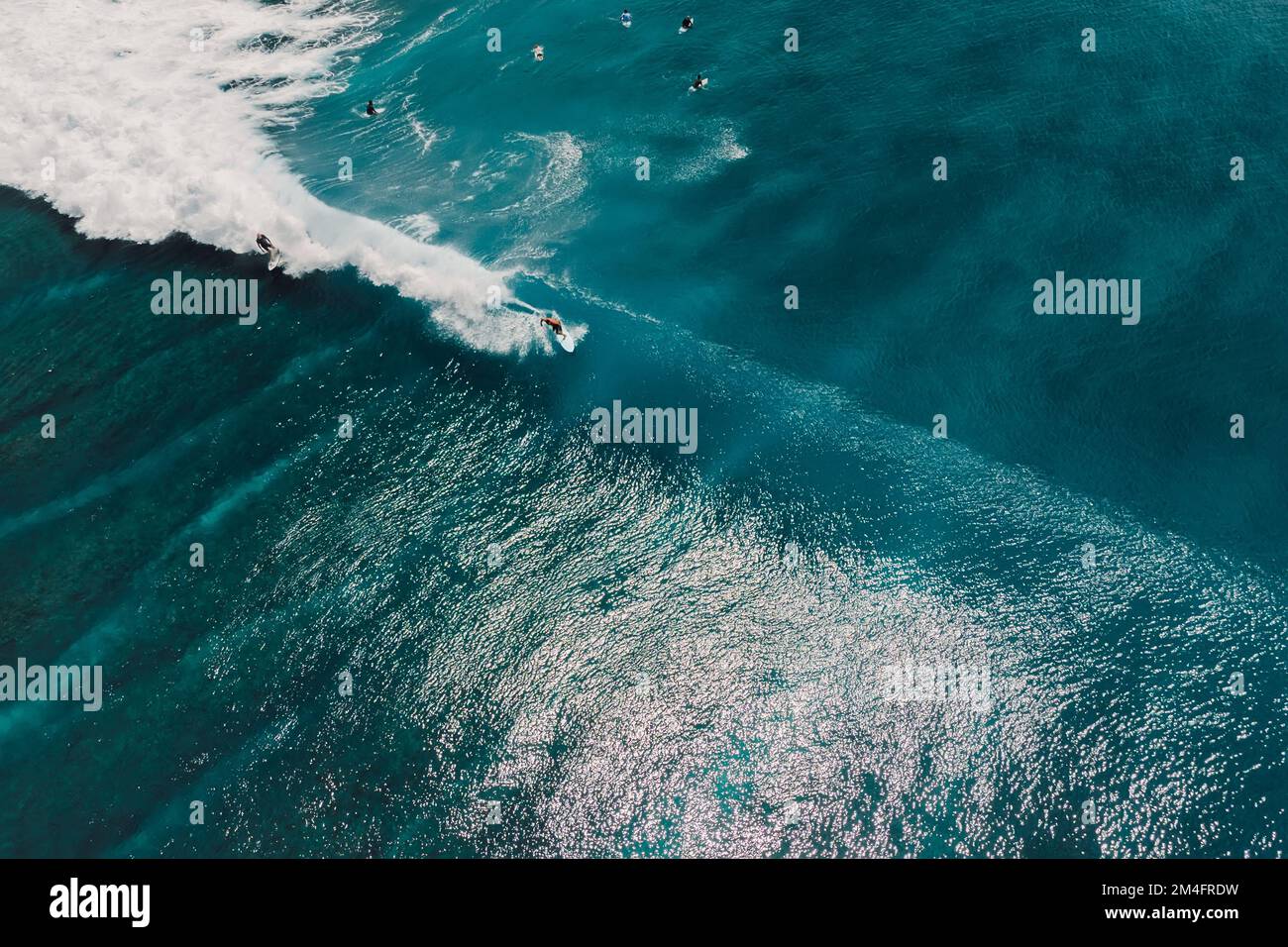 Aerial view with surfing on ideal wave. Perfect waves with surfers in ...
