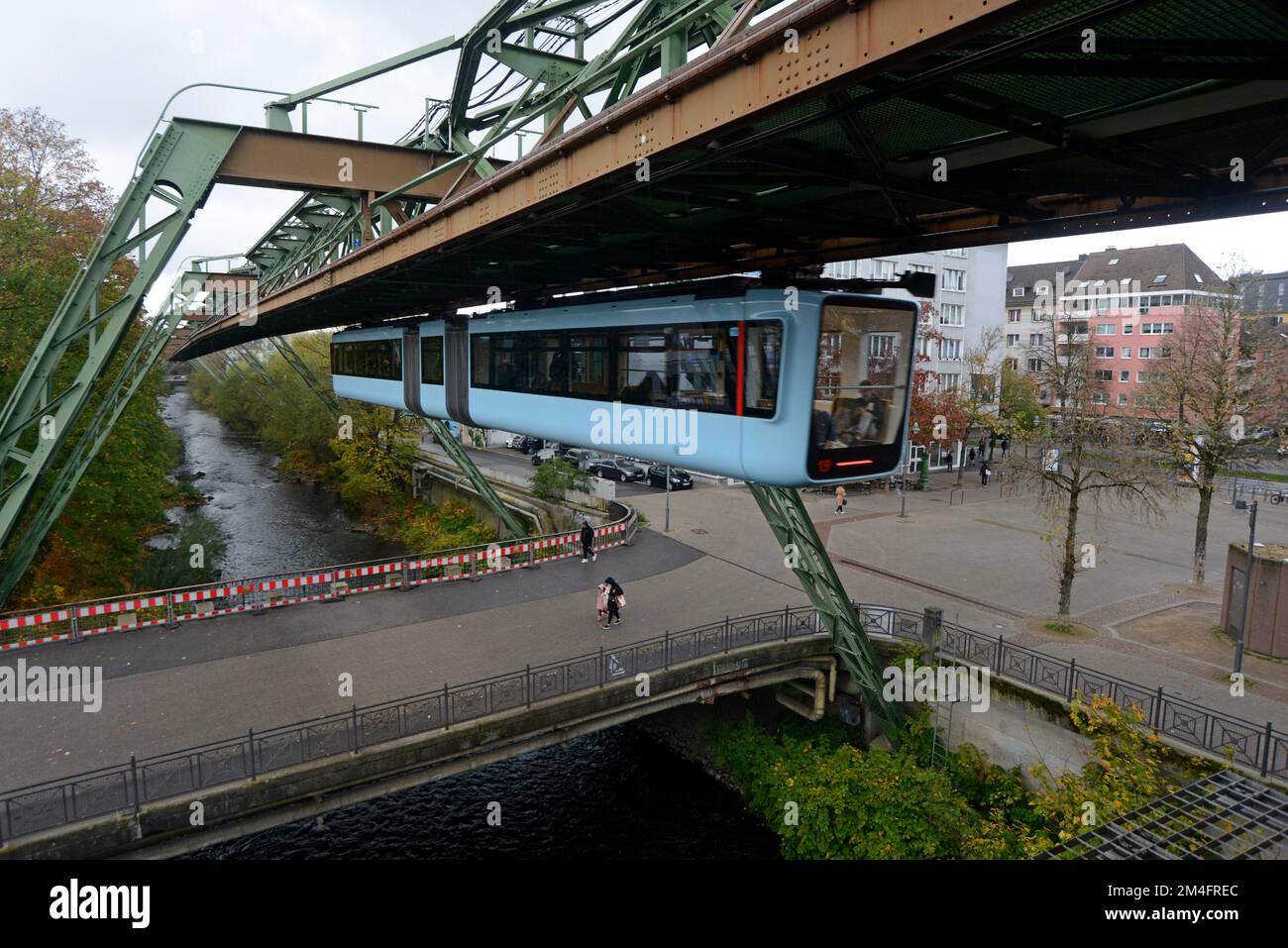 The unusual hanging monorail train knwn as the Schwebebahn, in ...