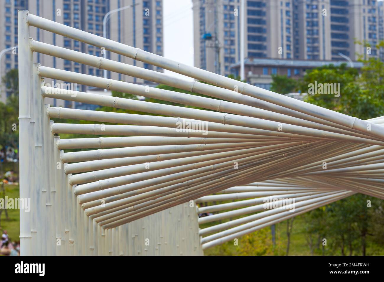 Close-up of steel pipe sculpture in the park Stock Photo - Alamy
