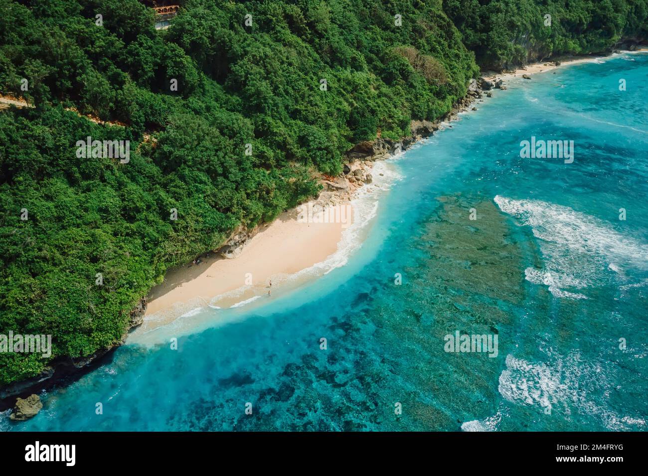 Beautiful beach with turquoise tropical ocean in Bali. Aerial view of ...