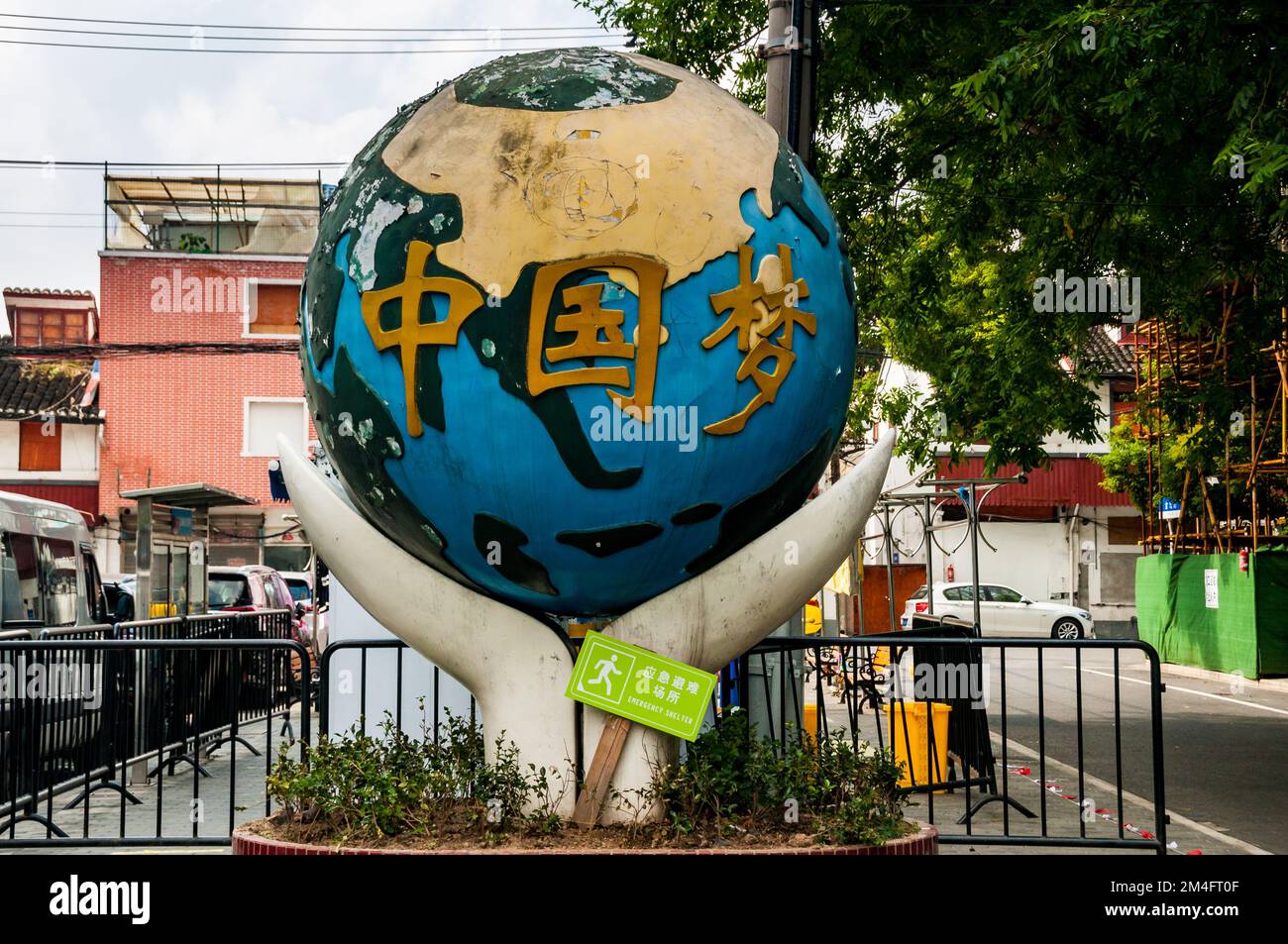 A faded globe with the Chinese characters reading China Dream in ...
