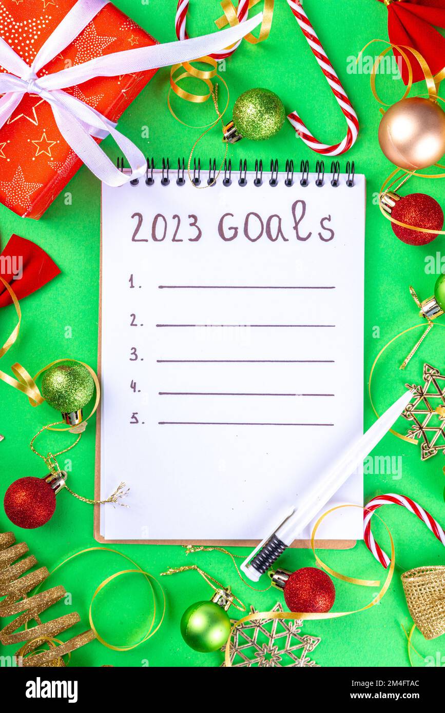 Notebook with New's Year Resolutions massage, with Christmas ornaments ...