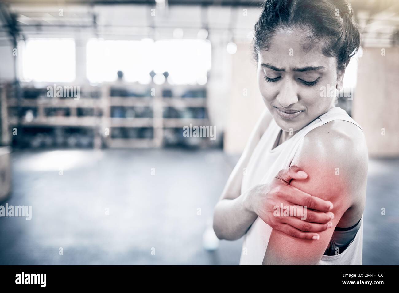Woman, fitness and shoulder pain in gym for exercise workout, training ...