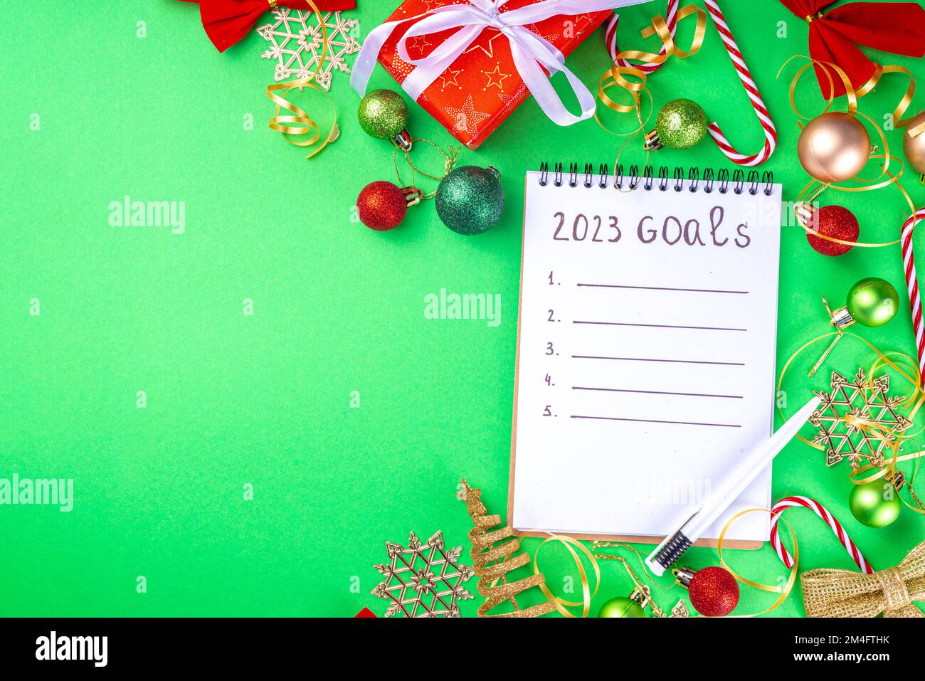 Notebook with New's Year Resolutions massage, with Christmas ornaments ...