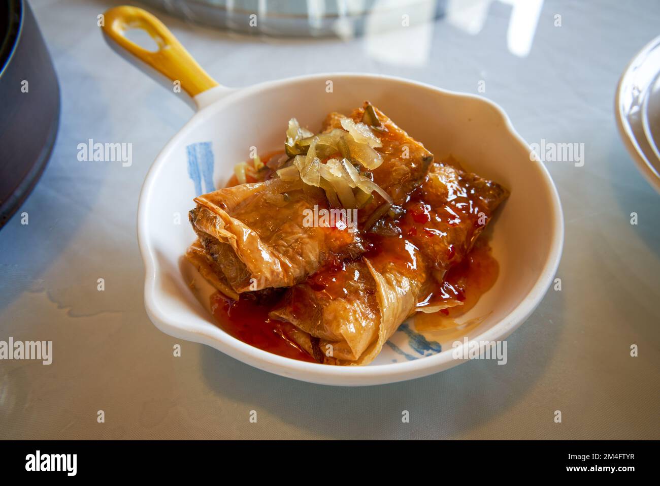 A classic and delicious Cantonese morning tea, steamed bean curd skin ...