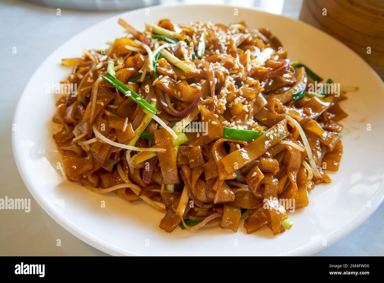 A plate of dry fried beef hor fun Stock Photo - Alamy
