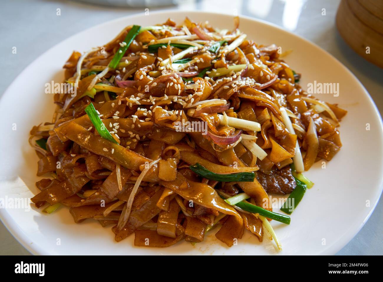 A plate of dry fried beef hor fun Stock Photo - Alamy