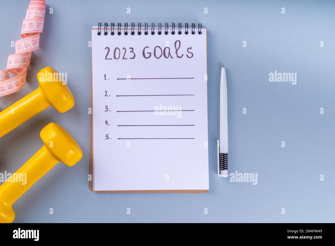 Simple background with Notebook with New's Year Resolutions massage ...