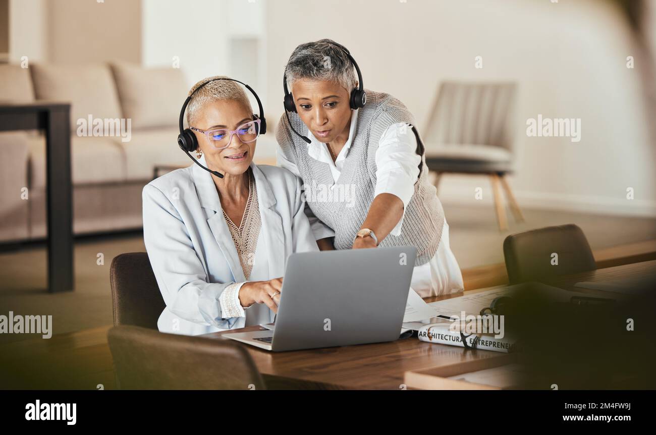 Laptop, consulting and woman help mentor while doing presentation in a ...