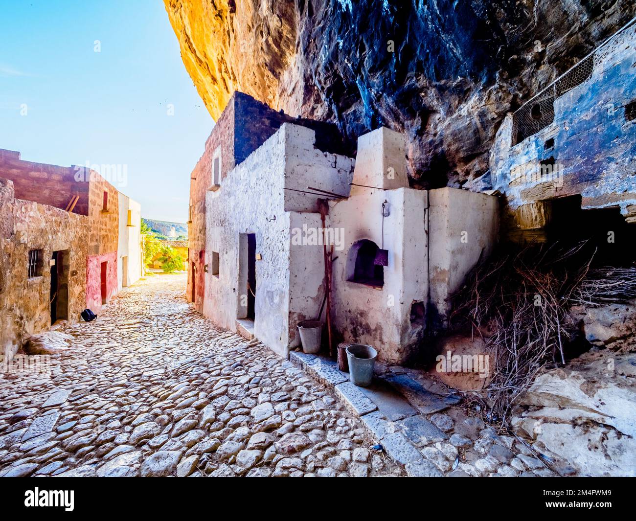 Open-air museum at the Scurati Caves or “Grotta Mangiapane” an ancient ...
