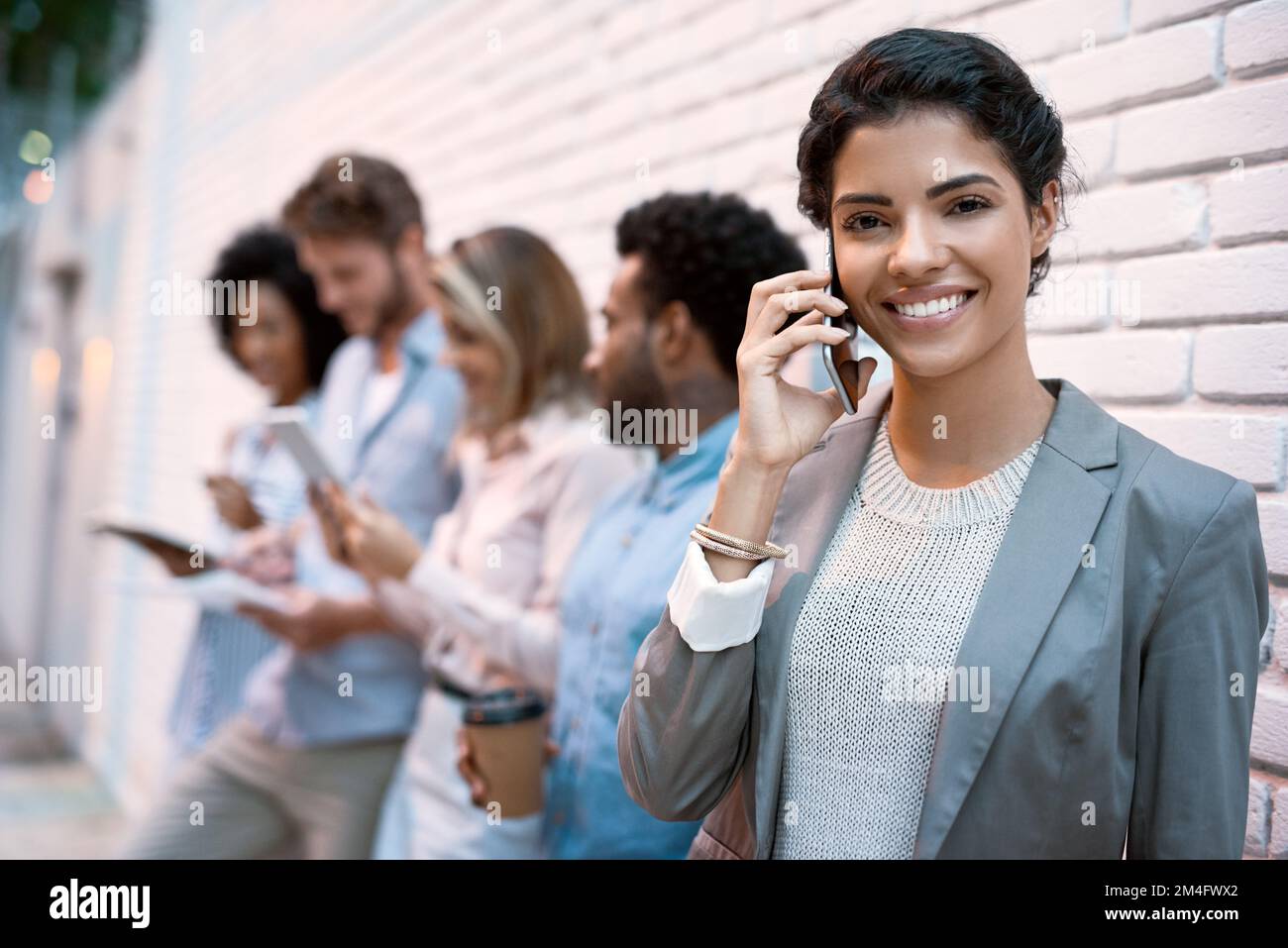 On the call helping clients with a design. young designers using ...