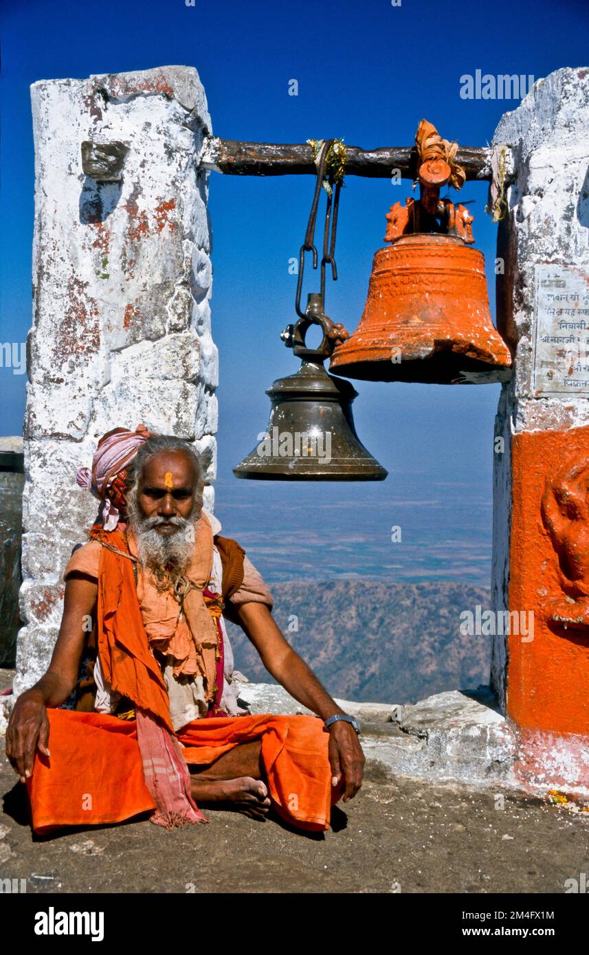 Old sadhu taking care of one of the temples on Girnar Hill Stock Photo ...