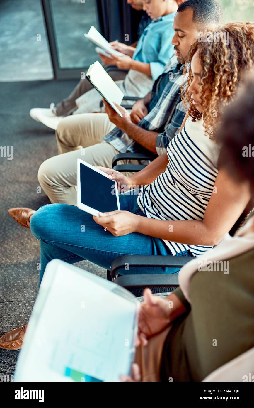 Every person is in their own work bubble. a group of young focussed ...