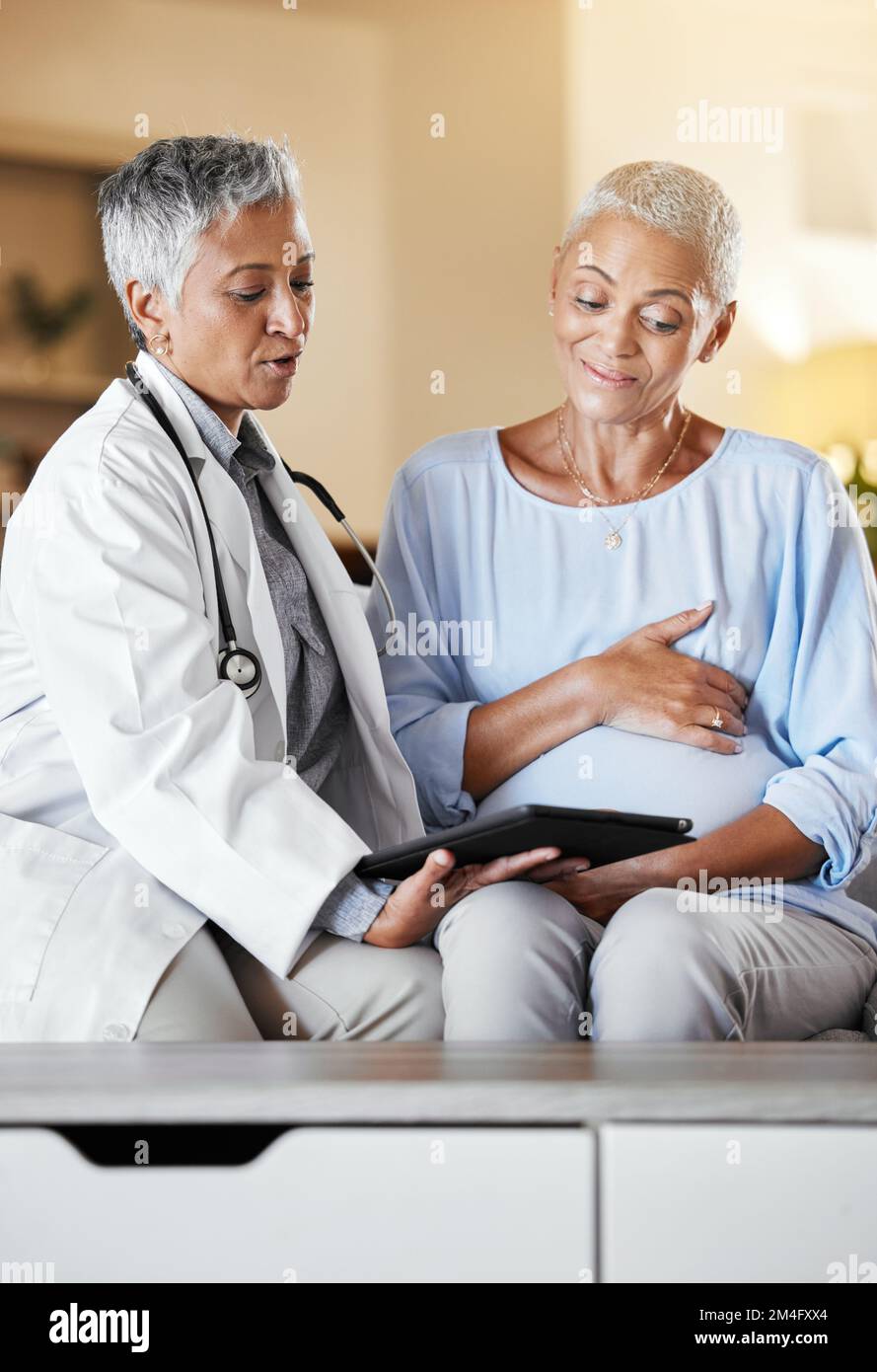 Pregnant, woman and senior ivf doctor on tablet for planning, results ...