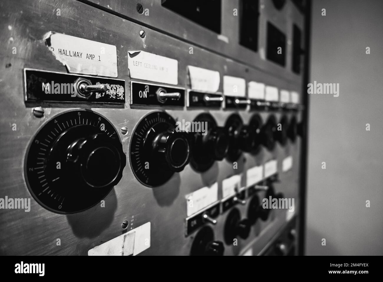 A closeup of switches and knobs on an antique control panel Stock Photo ...