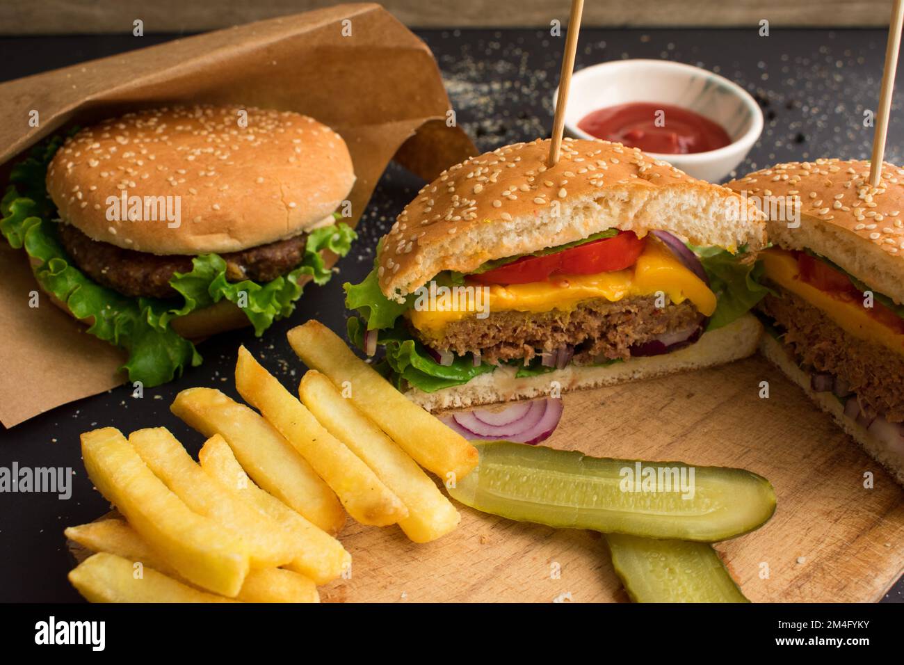 Delicious homemade hamburger, fast food presentation with french fries ...