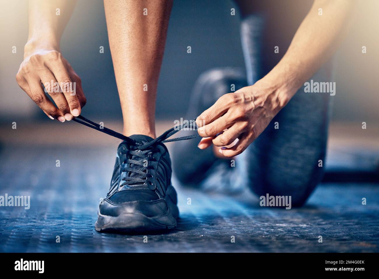 Fitness, gym and man tie shoes ready to start exercise, bodybuilder ...