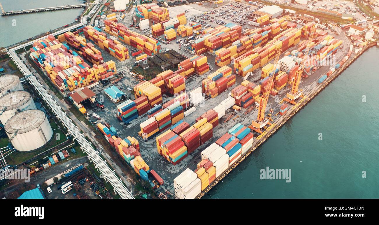 Containers in cargo freight port, aerial view. Industrial harbor ...