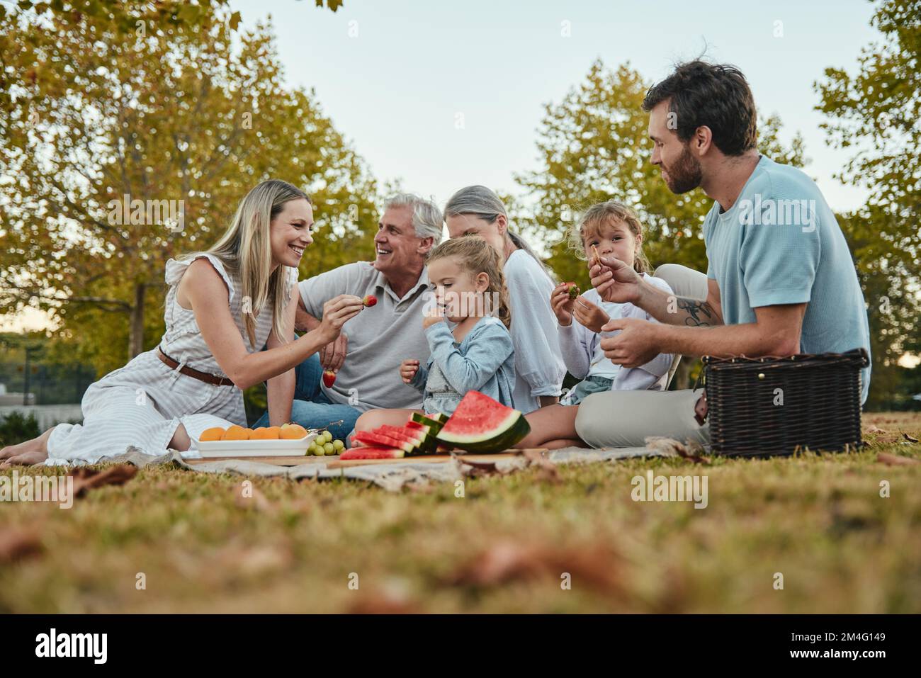 Big family eating watermelon in hi-res stock photography and images - Alamy