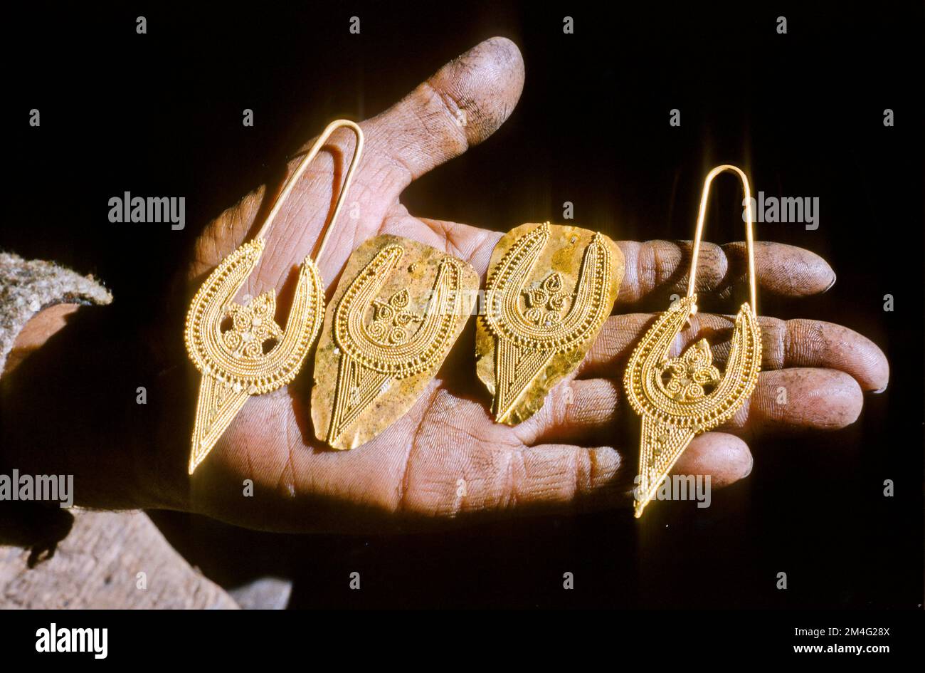 Goldsmith working on the typical jewellery of the women in village ...