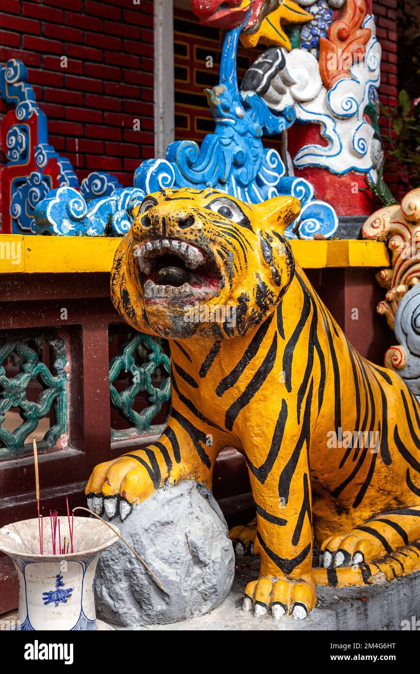 Tiger statue and symbolic carvings, Tran Hung Dao temple, Ho Chi Minh ...