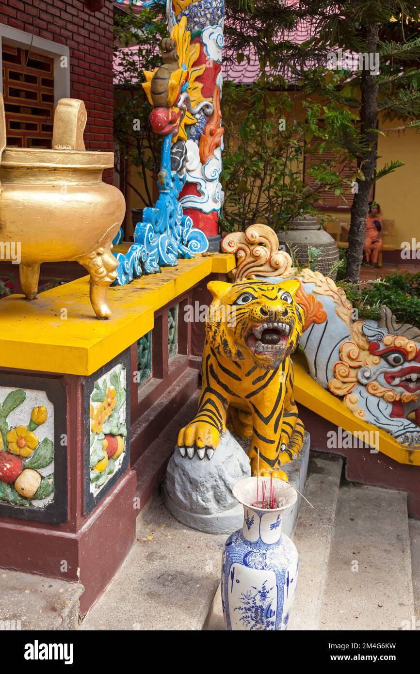 Tiger statue and symbolic carvings, Tran Hung Dao temple, Ho Chi Minh ...