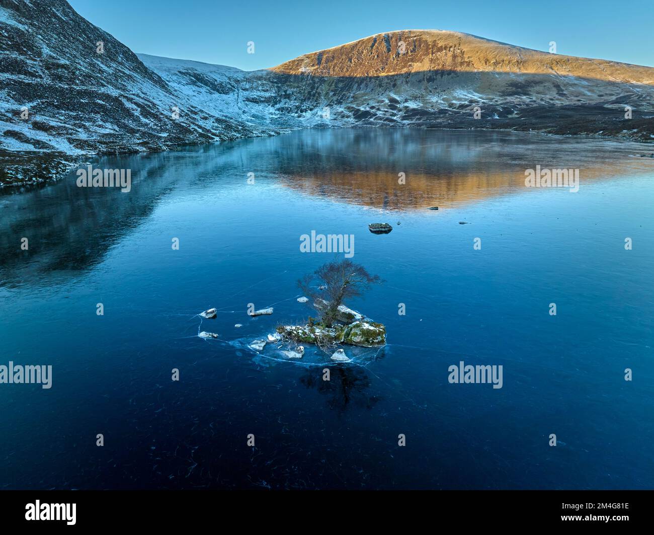 Aerial shot of Loch Skeen in the Grey Mare's Tail Nature Reserve at ...