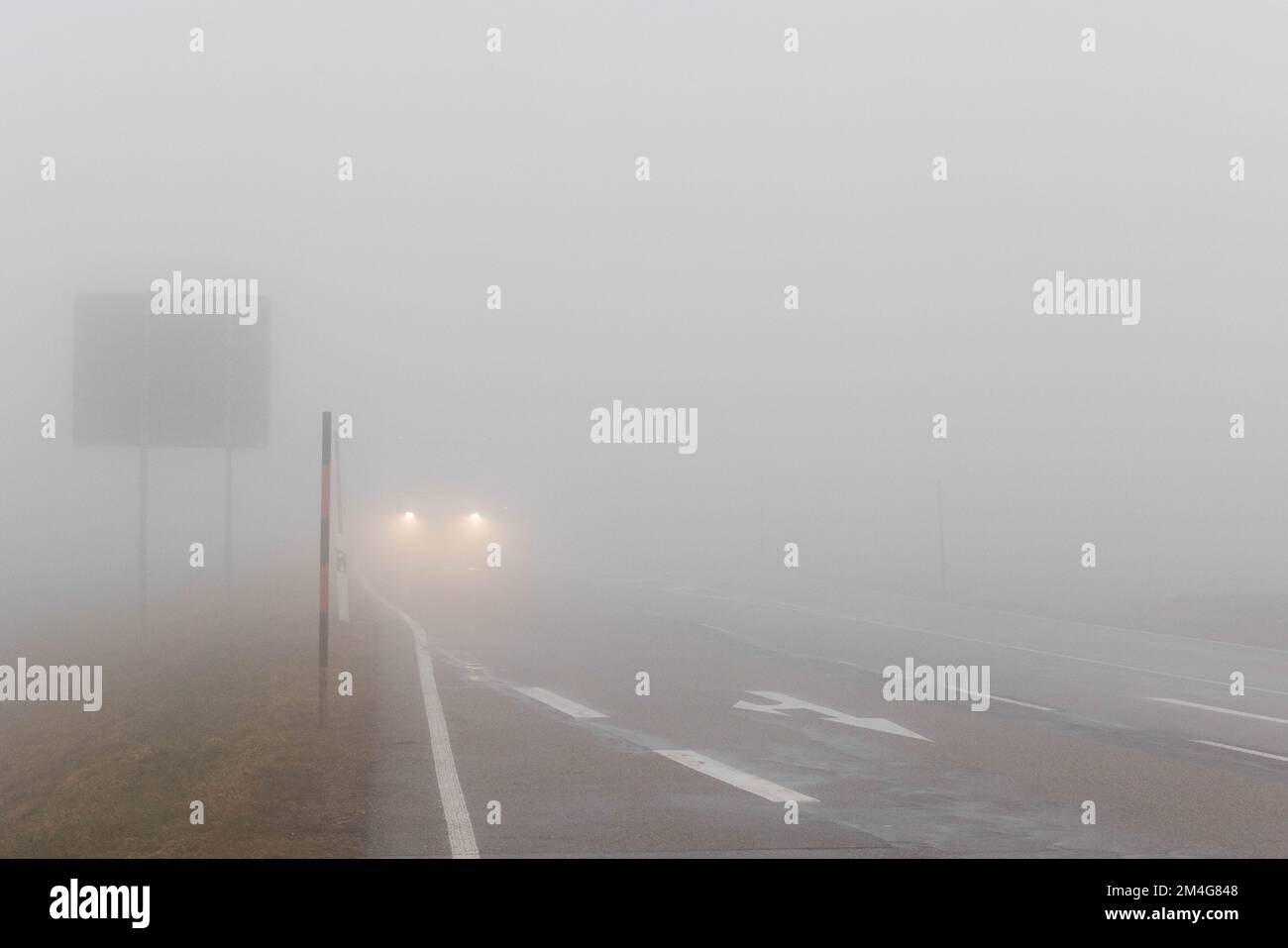 Oberried, Germany. 21st Dec, 2022. The lights of a delivery truck shine ...