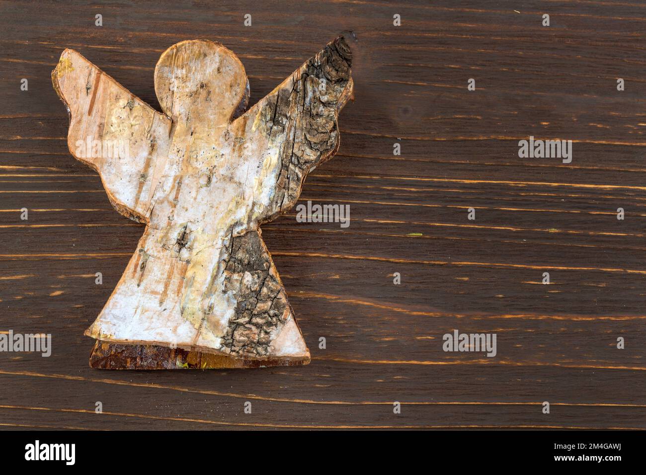 Christmas angle made of wood Stock Photo - Alamy