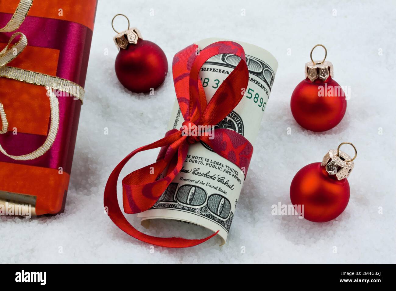 dollar bills as Christmas gift Stock Photo - Alamy