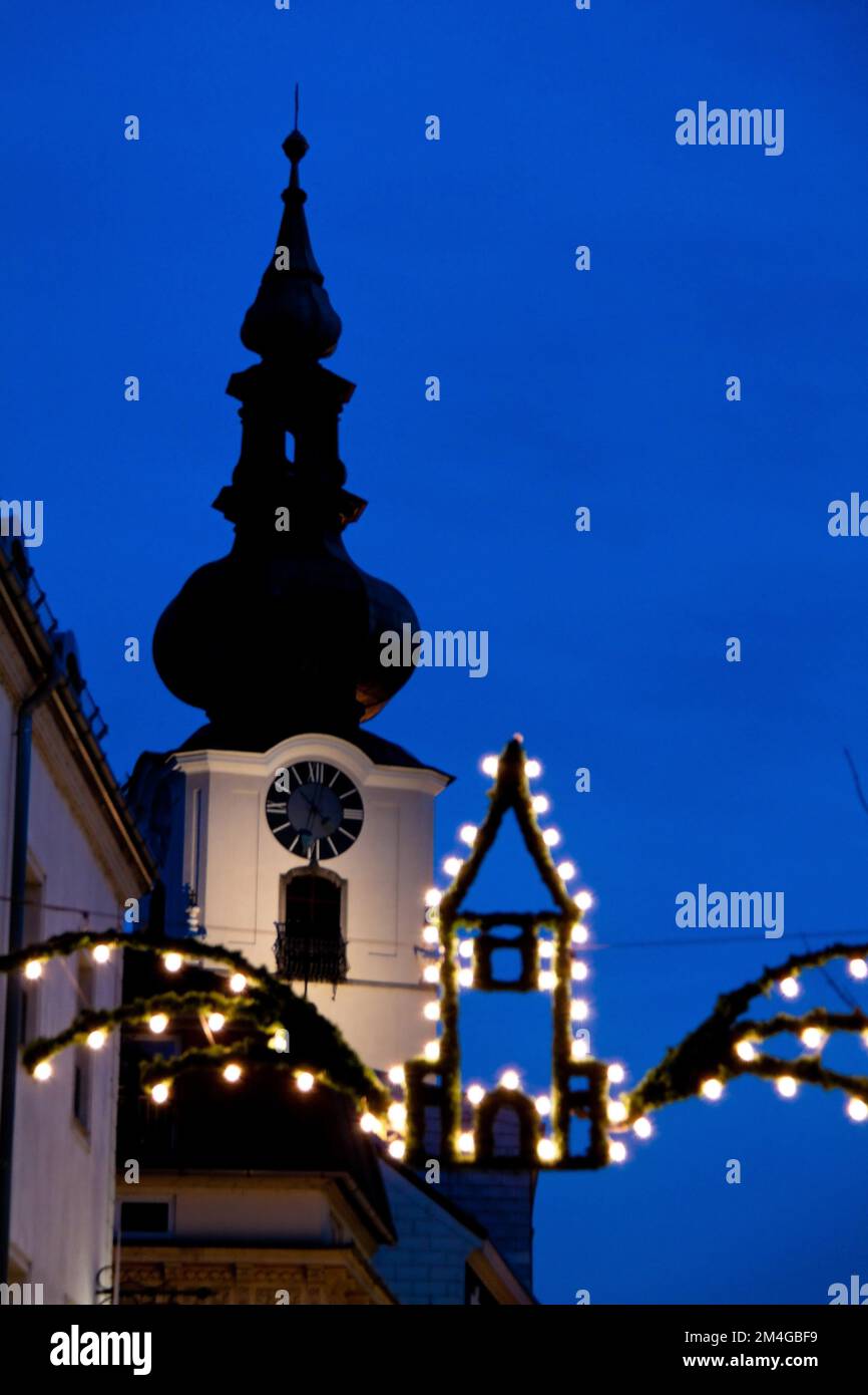 Christmas light with church steeple in advent in Wels, Austria, Upper ...