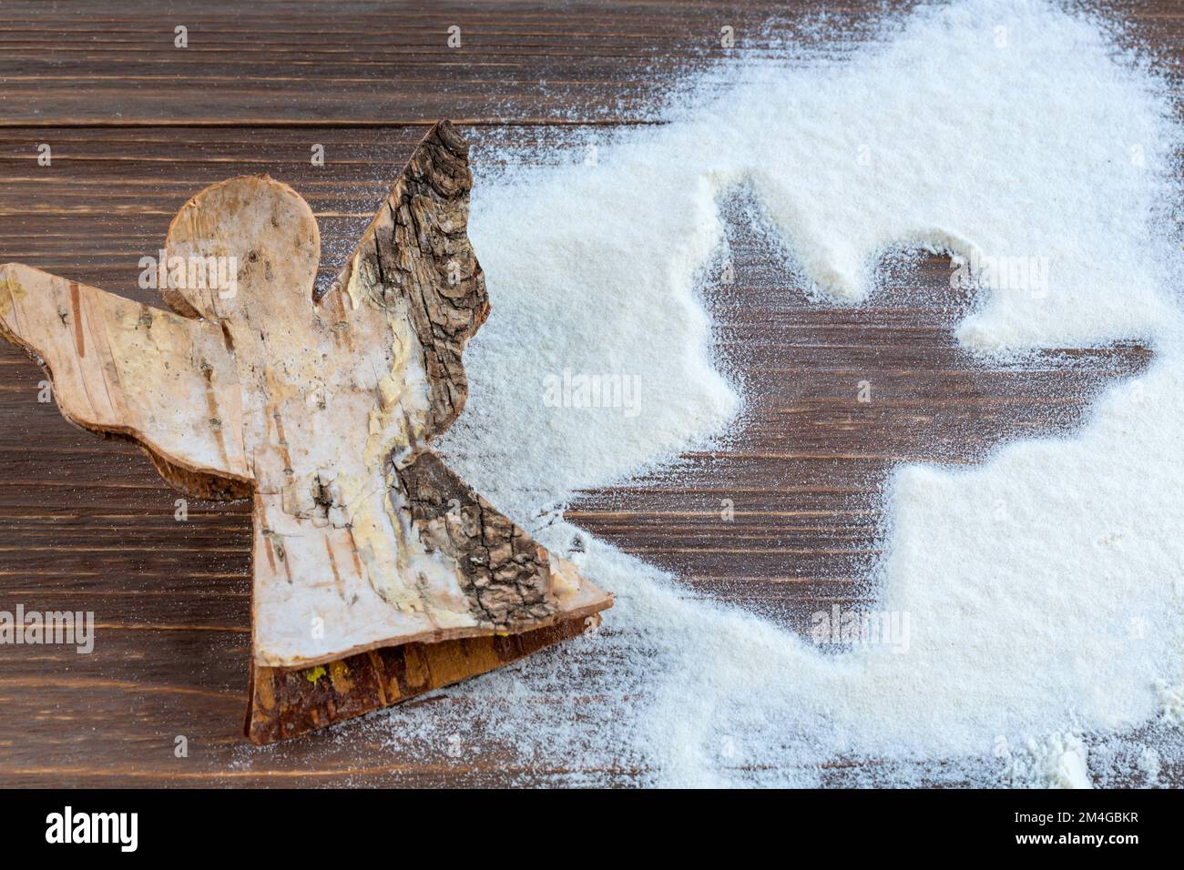 Christmas angle made of wood Stock Photo - Alamy