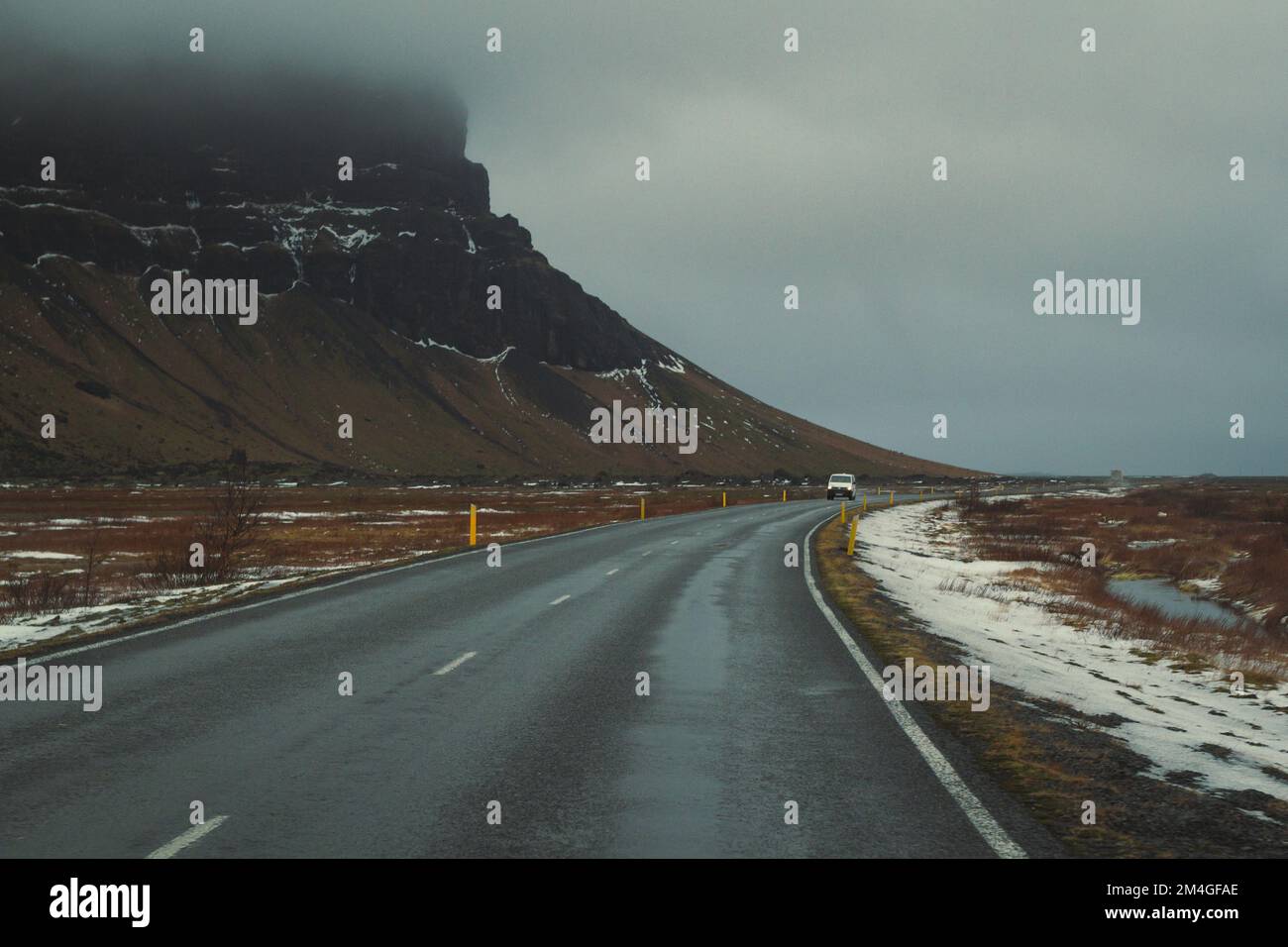 Car driving past mountain landscape photo Stock Photo - Alamy