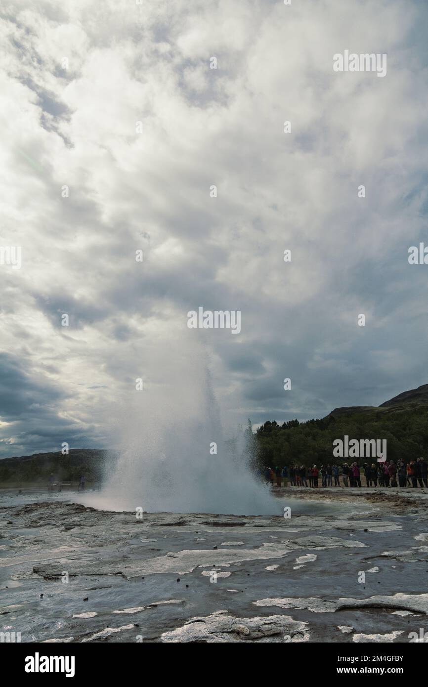 Hot geyser eruption landscape photo Stock Photo - Alamy