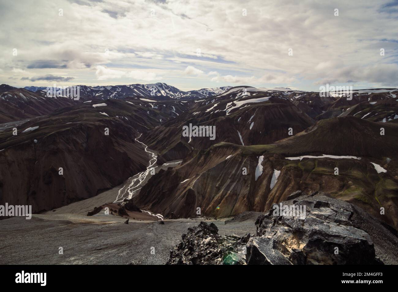River between old hills in valley landscape photo Stock Photo - Alamy