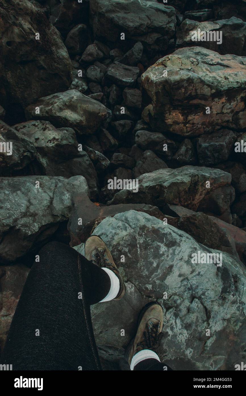 Close up woman standing on rock concept photo Stock Photo - Alamy