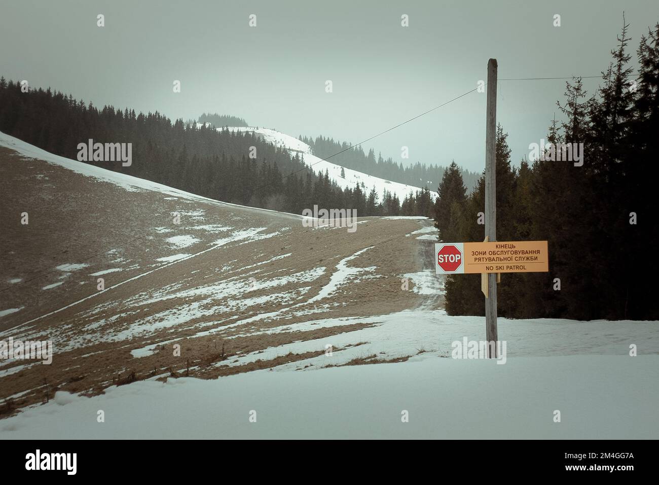 Warning sign for tourists in mountains landscape photo Stock Photo - Alamy